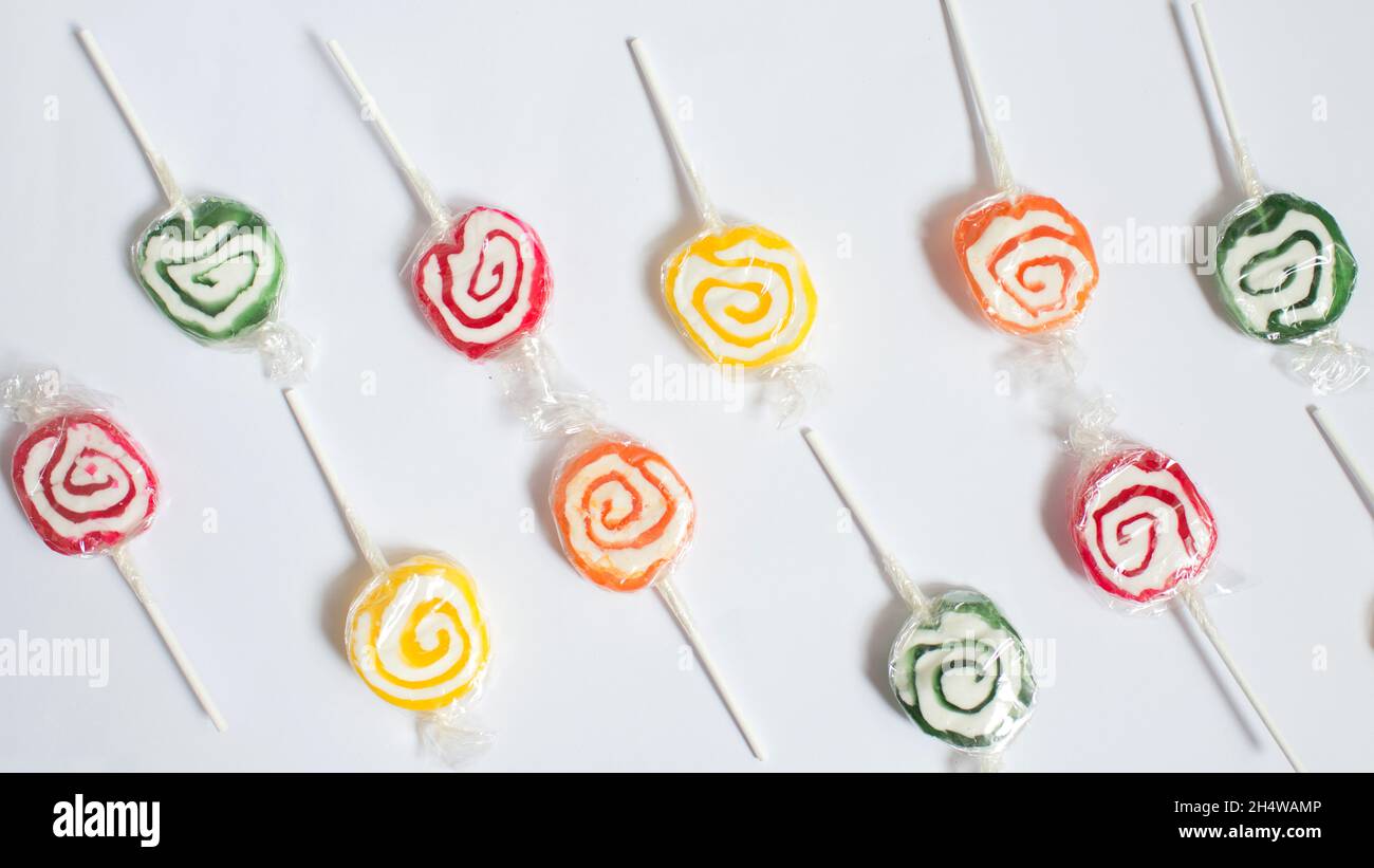 Colorful candy pattern lollipops hi-res stock photography and images ...
