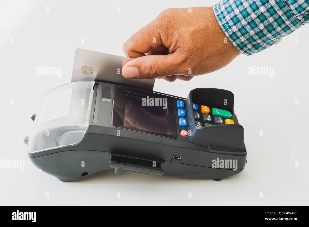 Hand man with credit card machine Stock Photo - Alamy