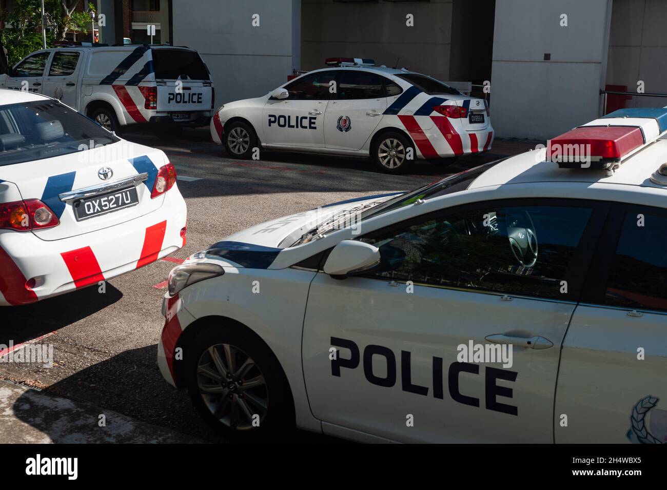 27102021 Singapore Republic Of Singapore Asia Police Patrol Cars Park In Front Of A