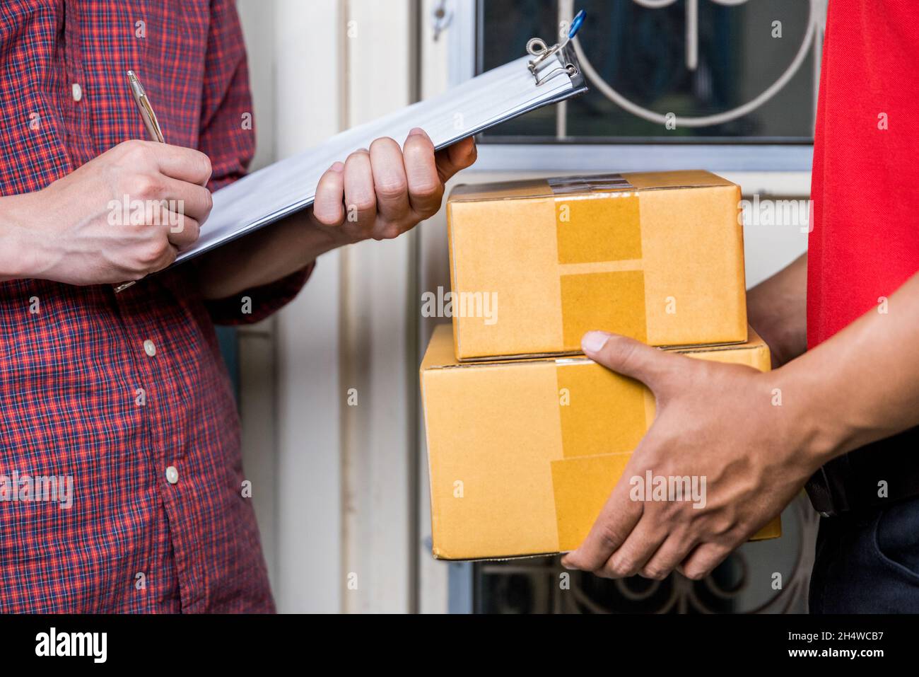 Close up hands courier man hi-res stock photography and images - Alamy