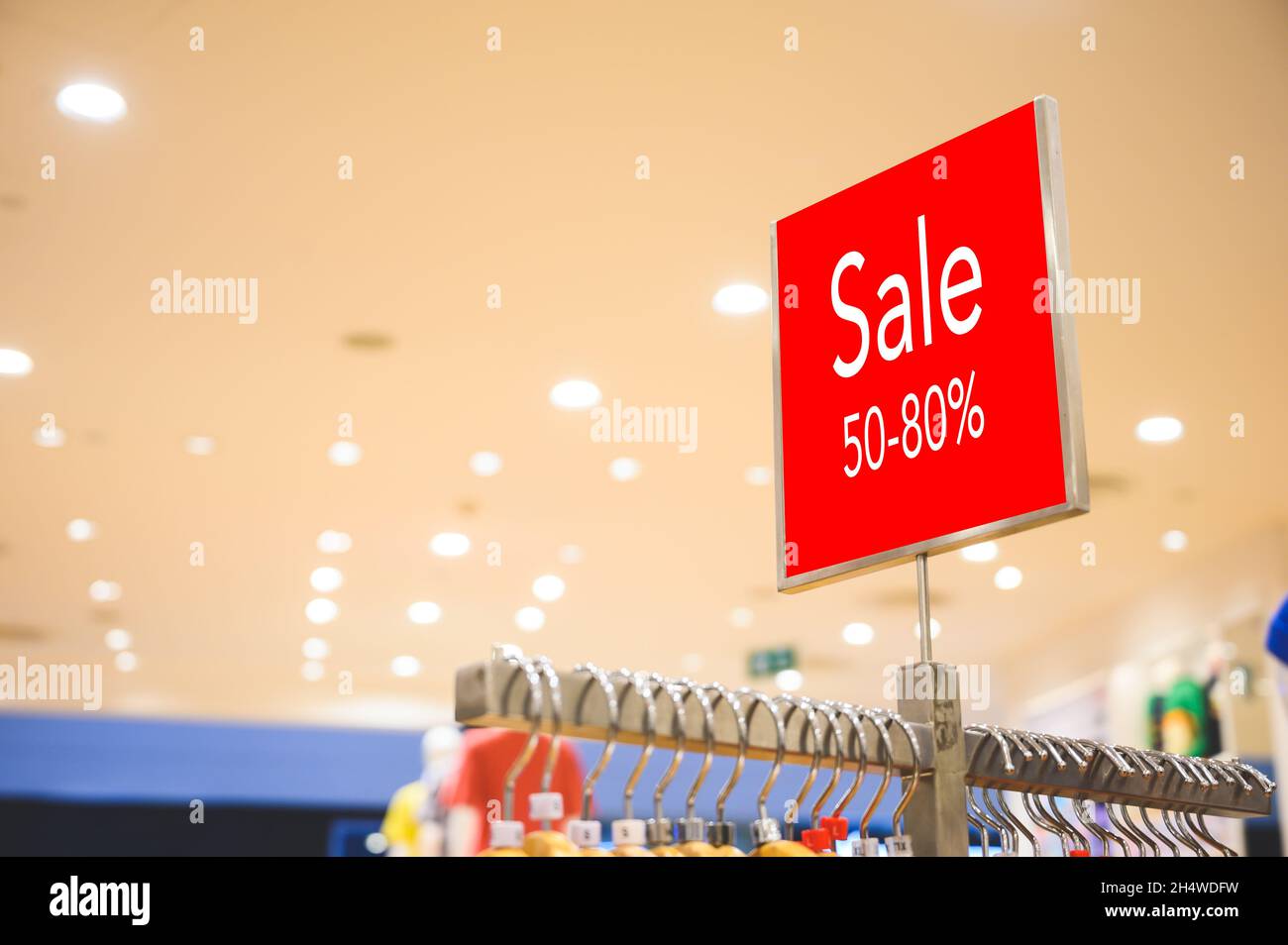 Sale mock up advertise display at clothes line Stock Photo - Alamy