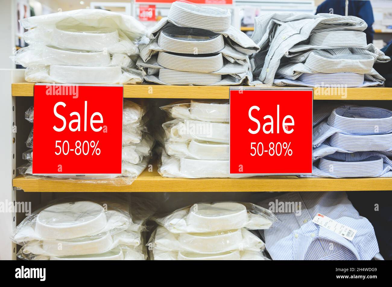 Sale mock up advertise display at clothes line Stock Photo - Alamy