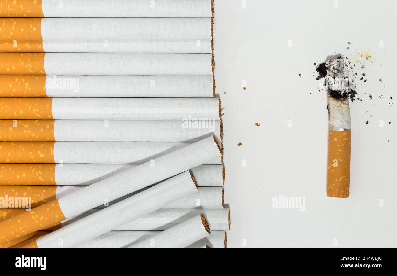 Stack of cigarette on white background isolated Stock Photo - Alamy