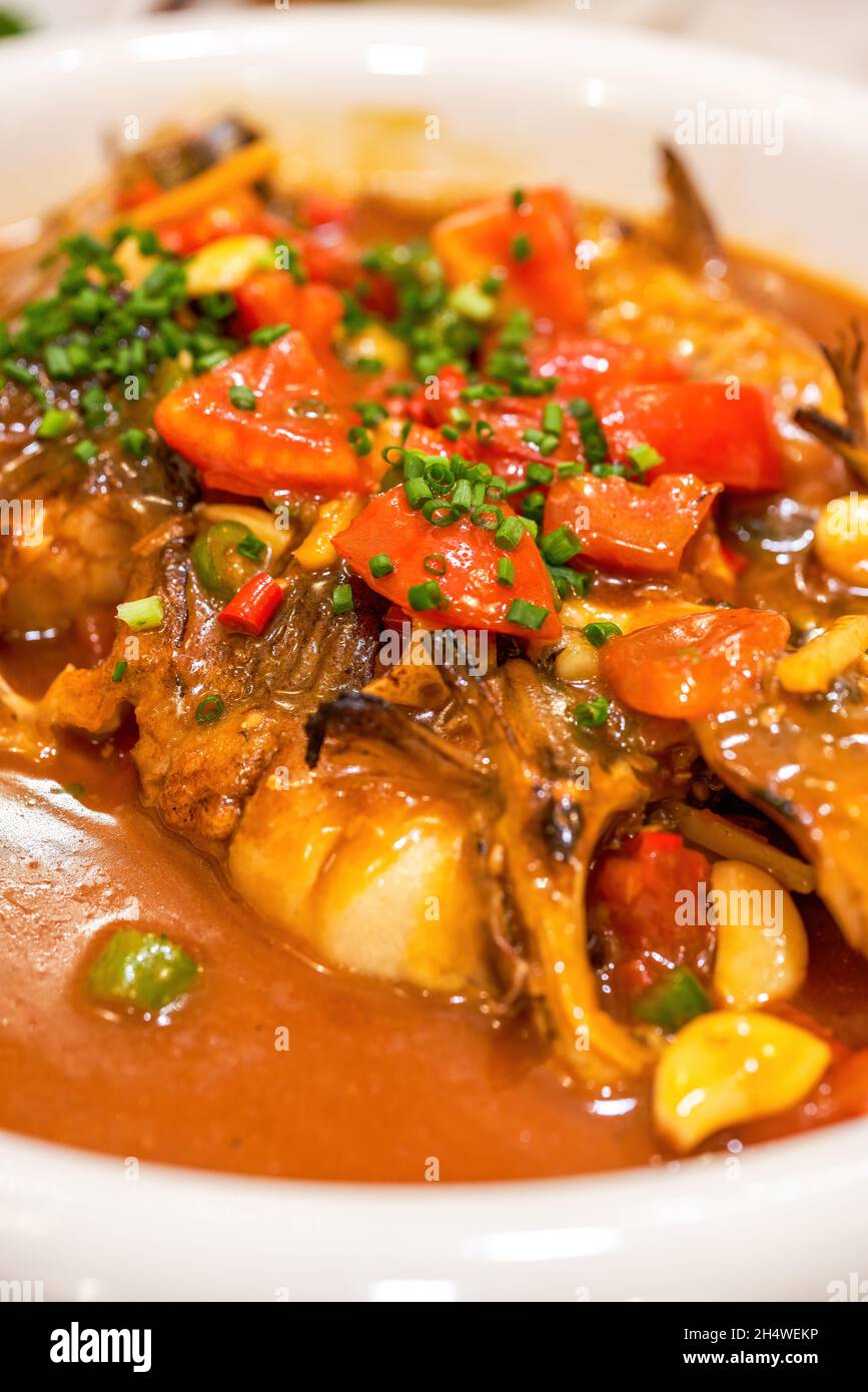 A delicious specialty of Guilin, Guangxi, China, braised tomato and ...