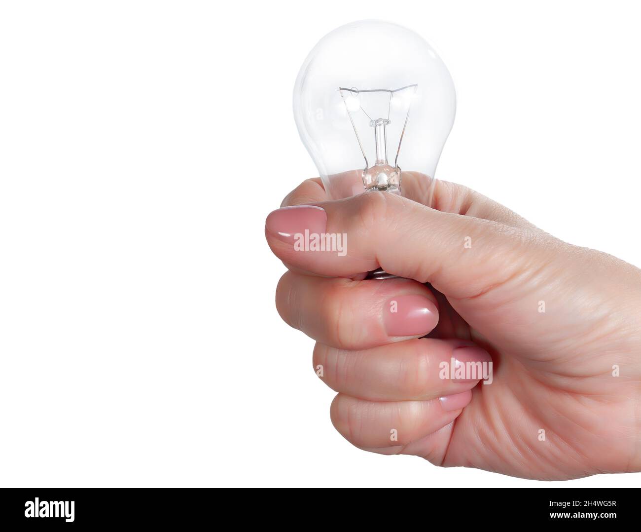 Woman's hand holding a light bulb isolated on white background. Mock up ...