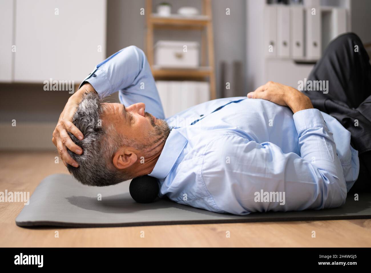 Neck Trigger Point Massage Using Foam Ball Myofascial Release Stock ...