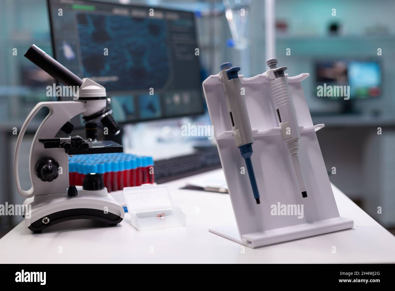Nobody in research laboratory with micro pipette on desk. Empty ...