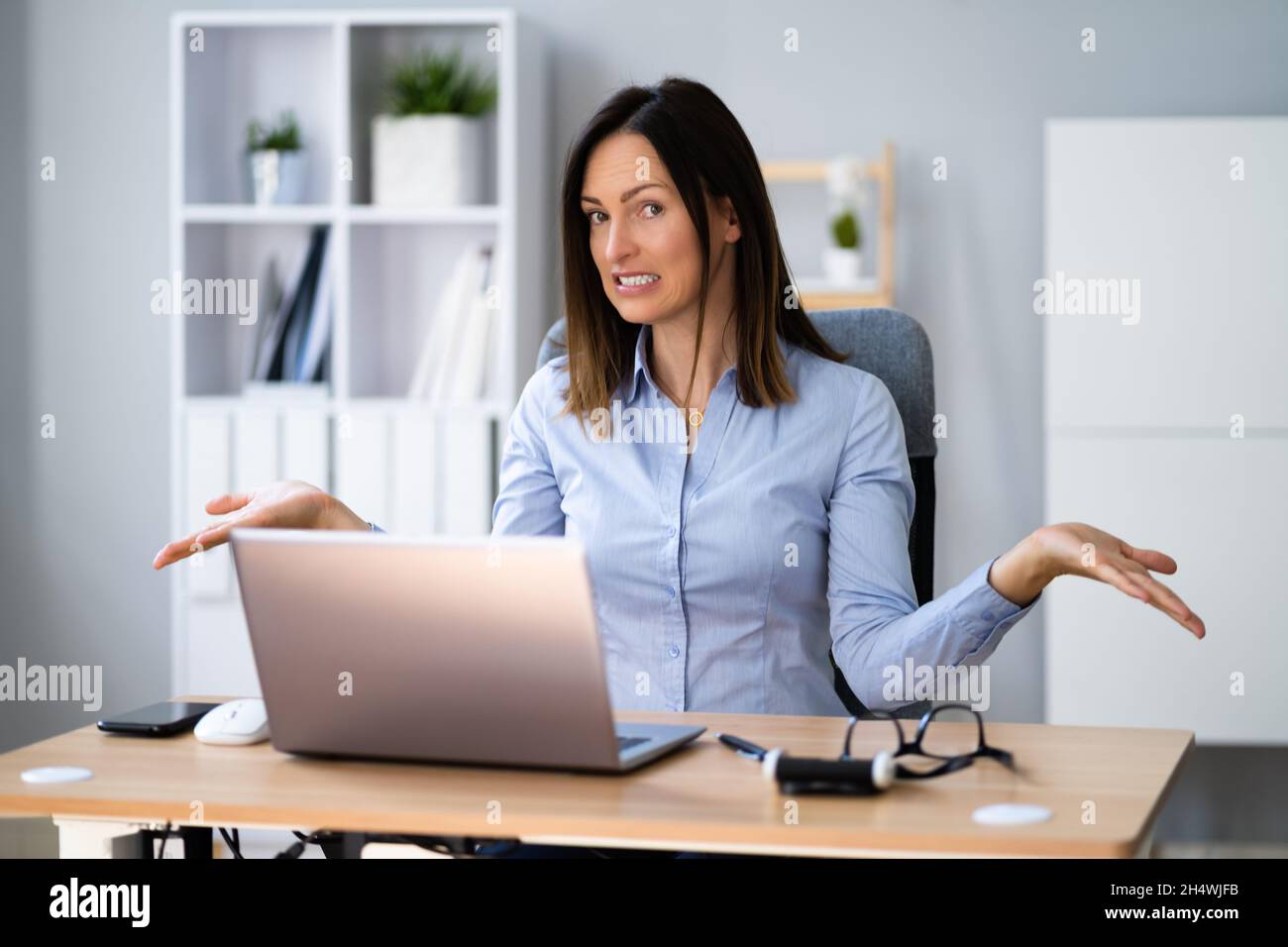Confused Sad Woman In Online Interview Video Conference Stock Photo - Alamy