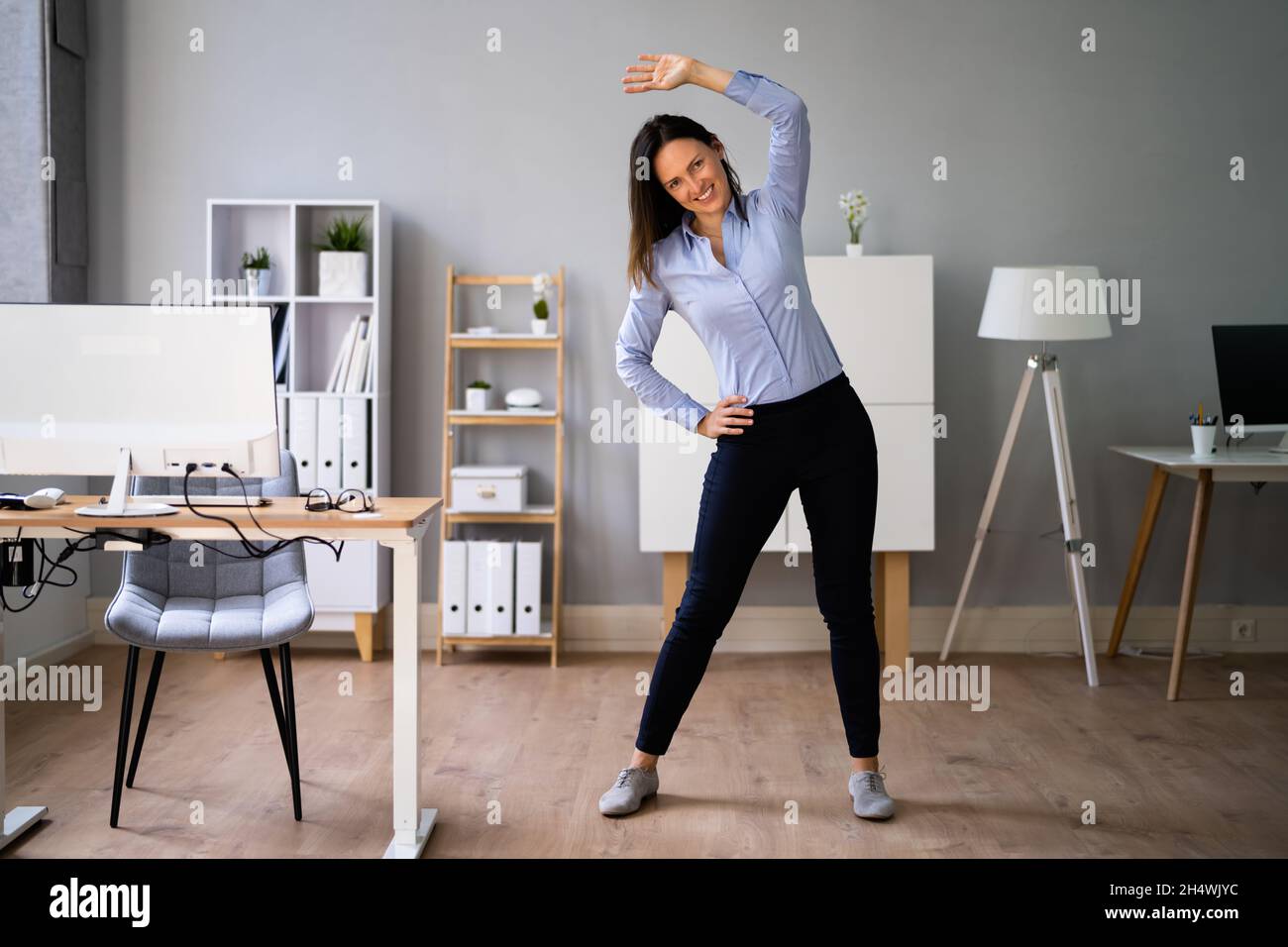 Stretching Office Workout. Desk Stretch Exercise At Workplace Stock ...
