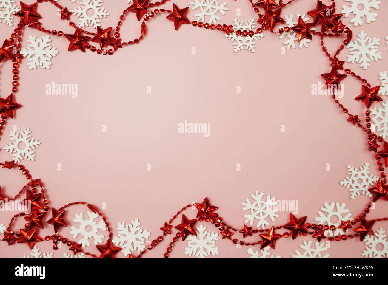 Christmas Ornament border frame on pink background Stock Photo - Alamy