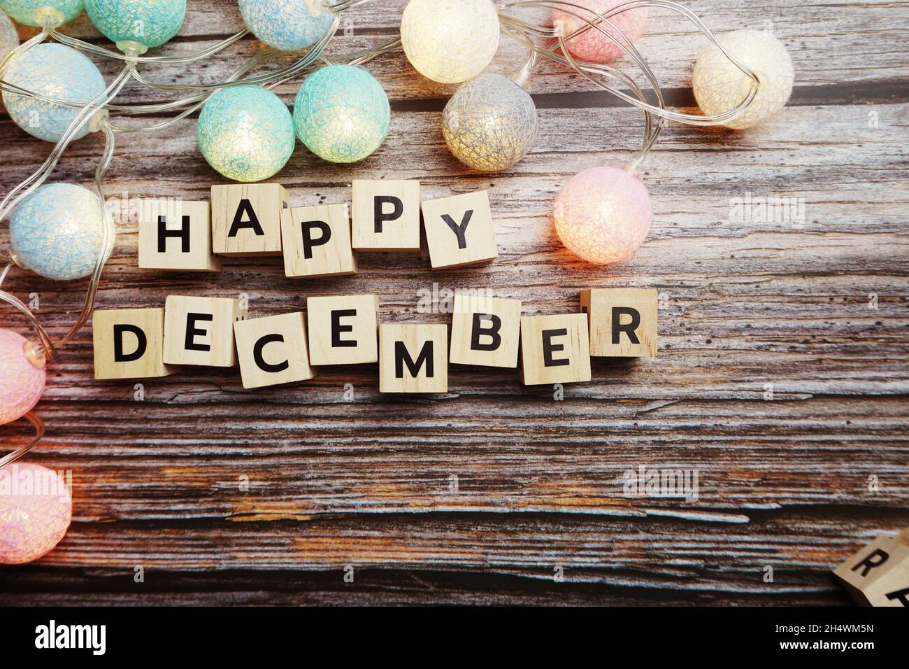 Happy December alphabet letter with LED Cotton ball Decoration on ...