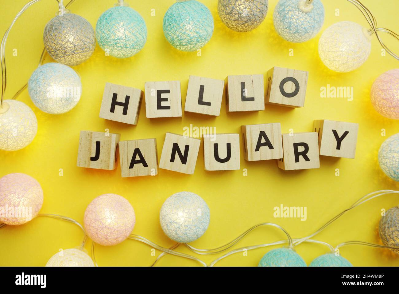 Hello January alphabet letter with LED Cotton ball Decoration on yellow ...