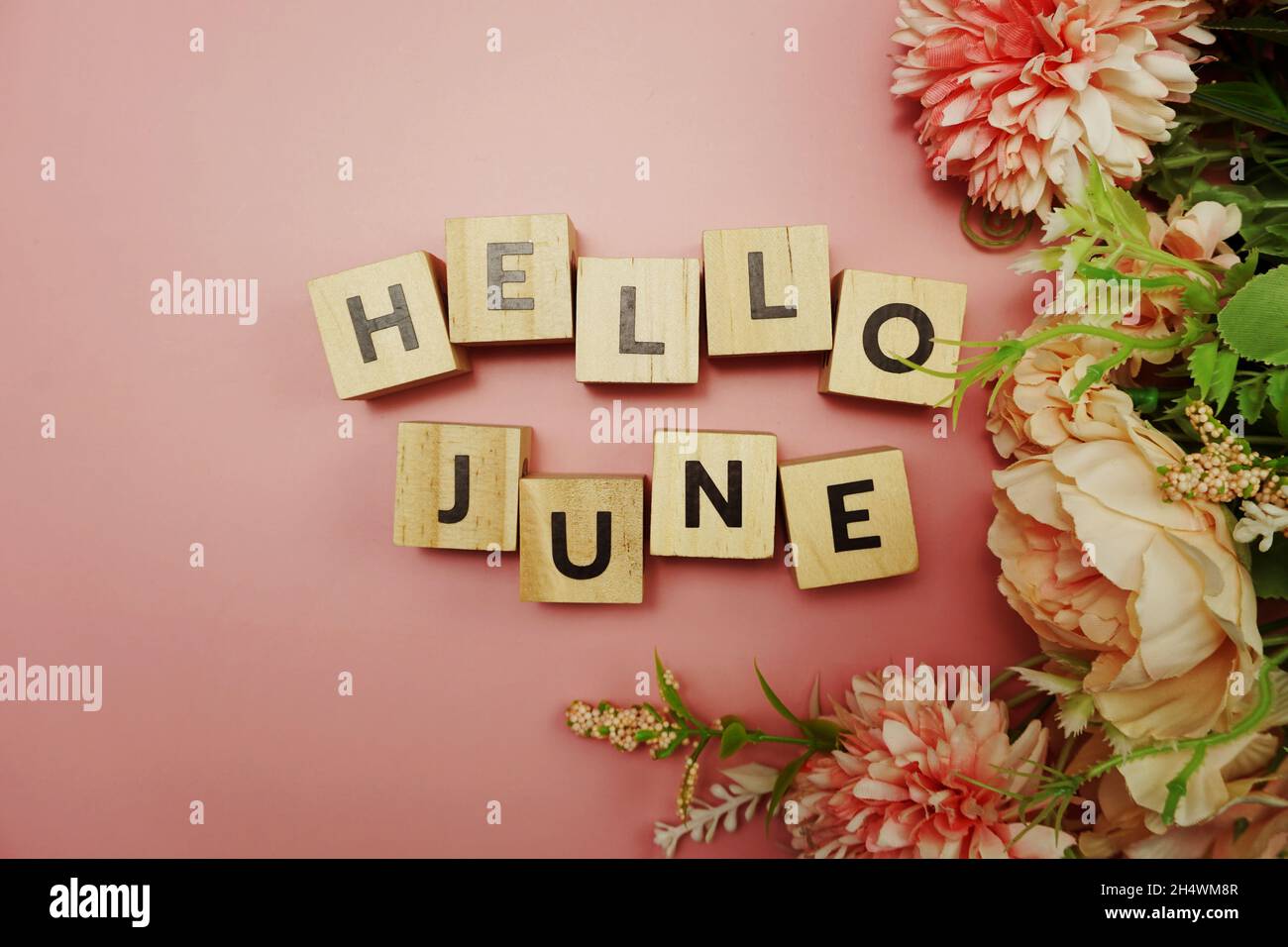 Hello June alphabet letter with space copy on pink background Stock ...