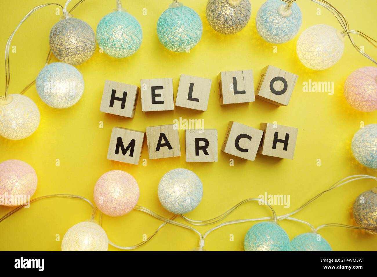 Hello March alphabet letter with LED Cotton ball Decoration on yellow ...