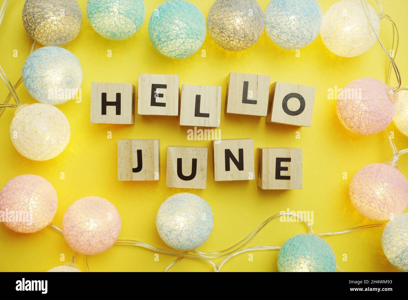 Hello June alphabet letter with LED Cotton ball Decoration on yellow ...