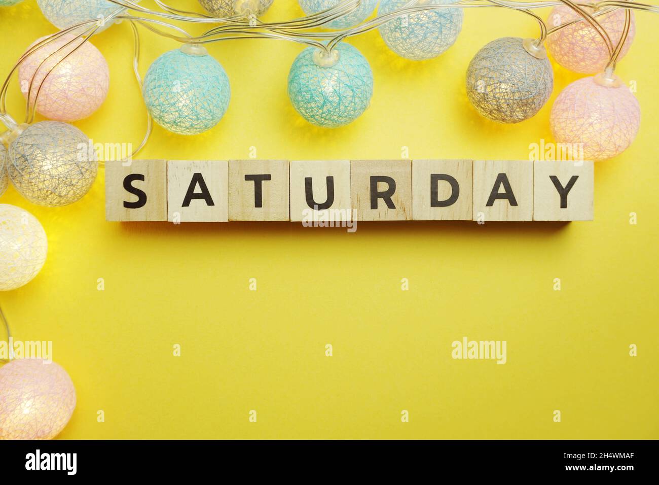Saturday alphabet letter with LED Cotton ball Decoration on yellow ...