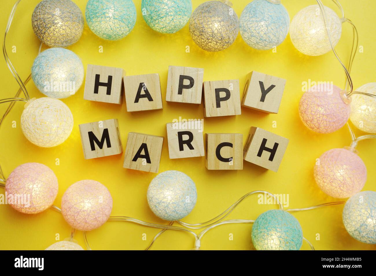 Happy March alphabet letter with LED Cotton ball Decoration on yellow ...
