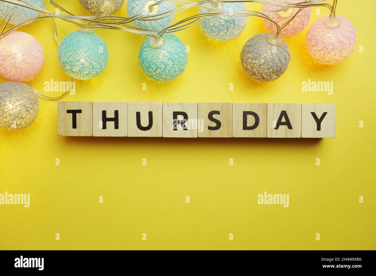 Thursday alphabet letter with LED Cotton ball Decoration on yellow ...