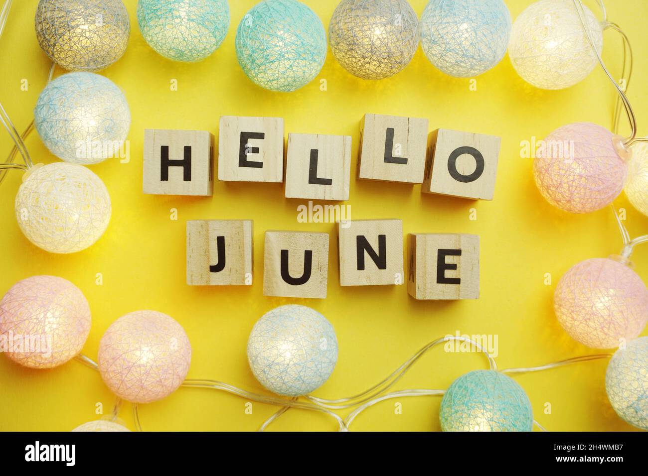 Hello June alphabet letter with LED Cotton ball Decoration on yellow ...