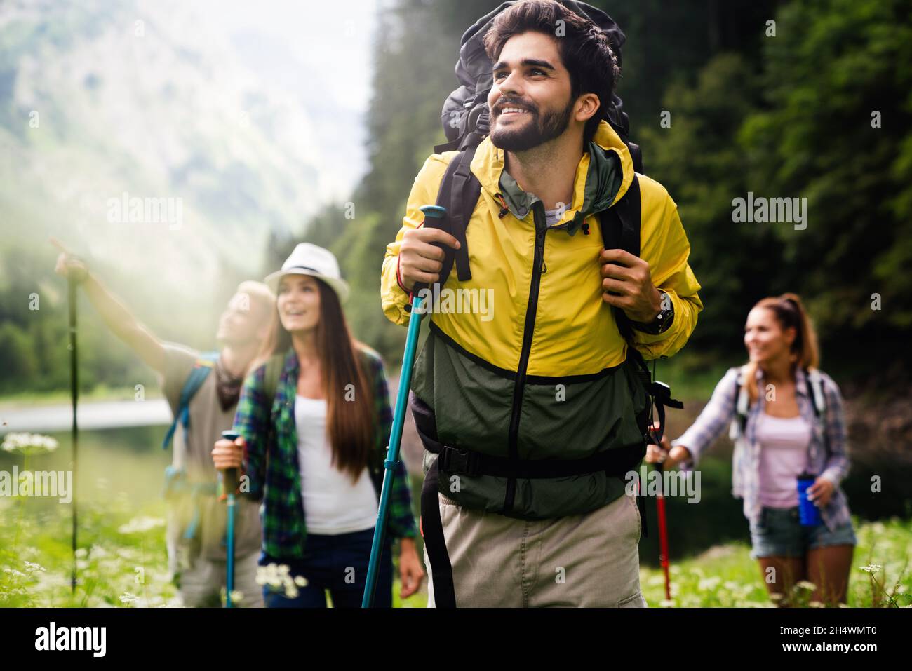 Group of happy friends enjoying outdoor activity together Stock Photo ...
