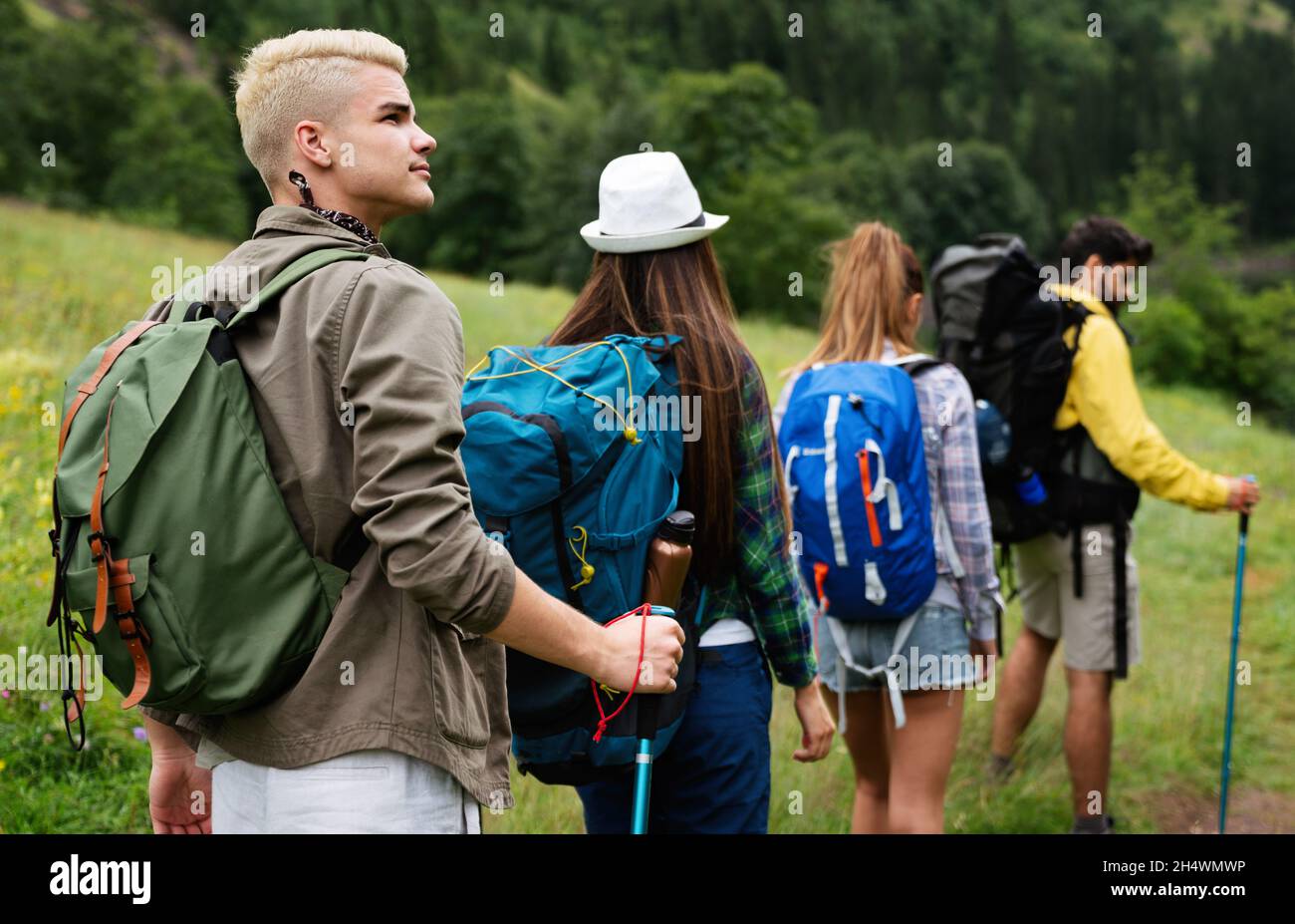 Group of happy hiker friends trekking as part of healthy lifestyle ...