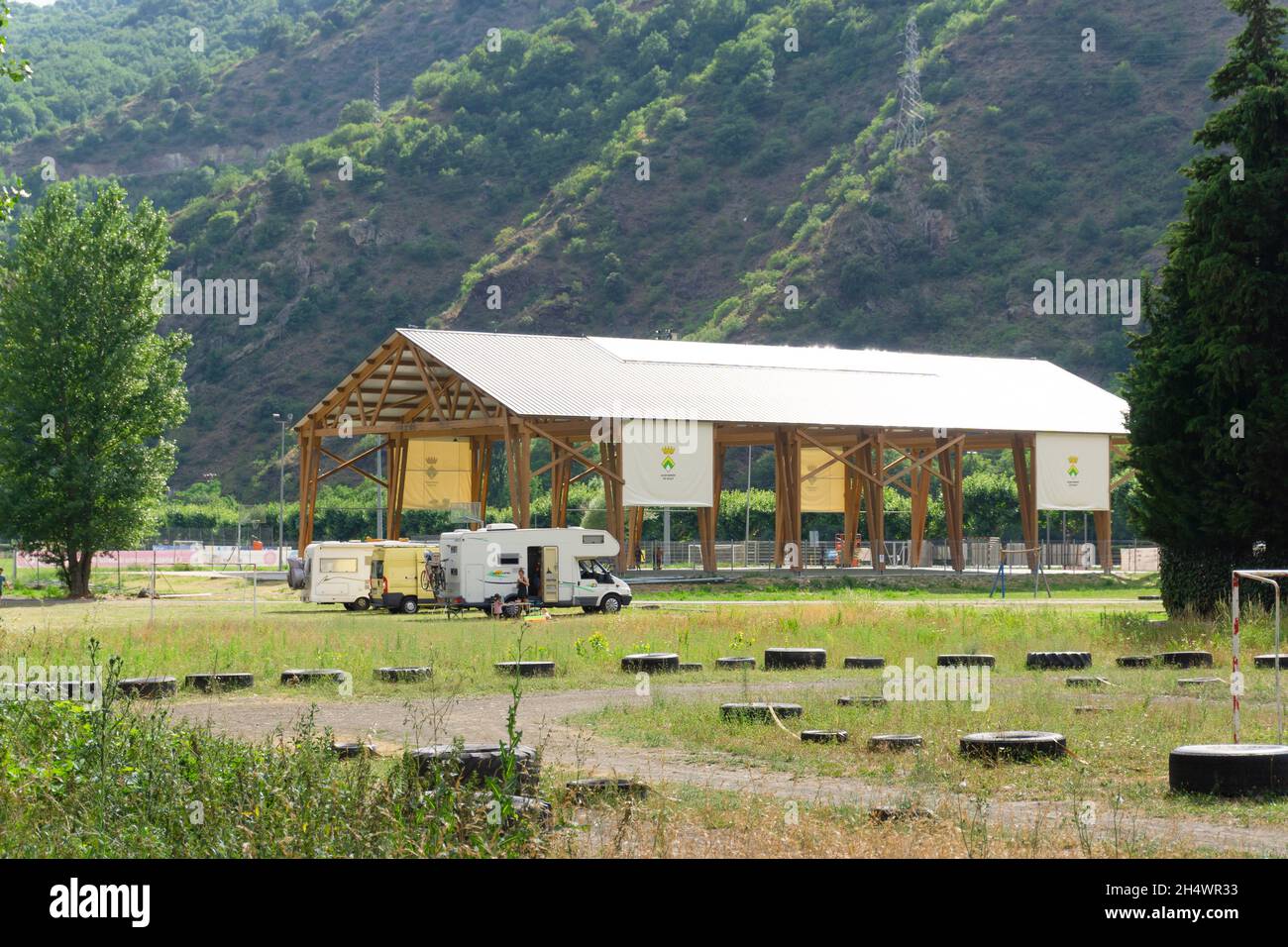 SORT, SPAIN - July 27, 2021: People with caravans next to the soccer ...