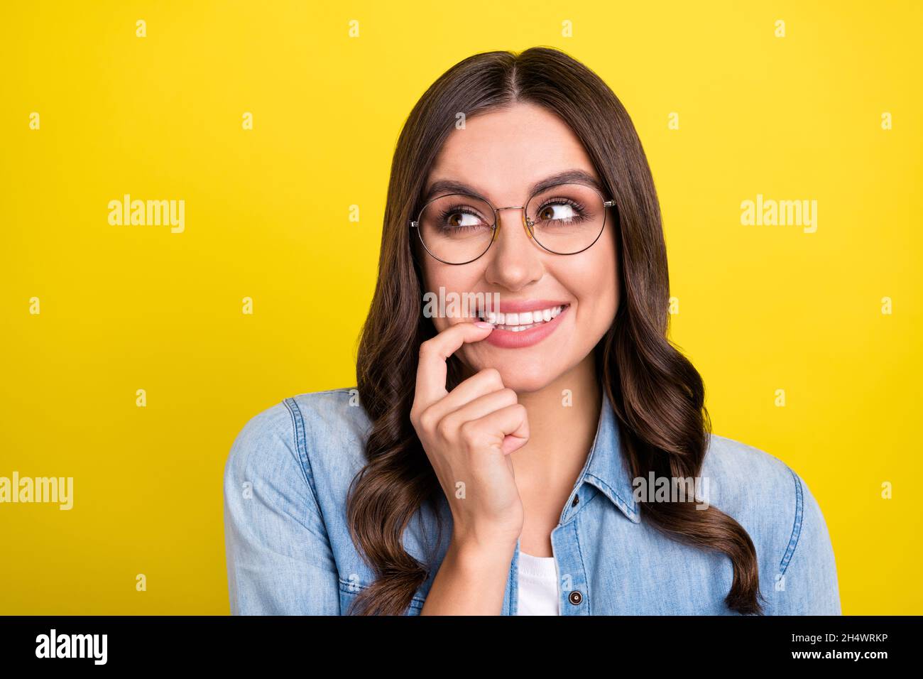Photo of sweet adorable young lady wear jeans shirt spectacles smiling ...