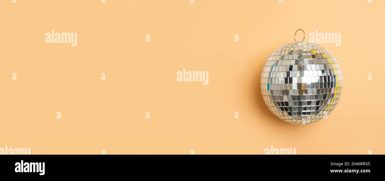 Disco ball on camel background isolated. Horizontal creative poster ...