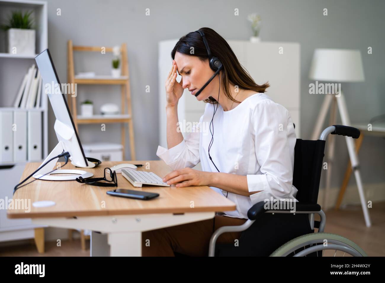 Bored Employee In Video Conference Training Meeting Stock Photo - Alamy