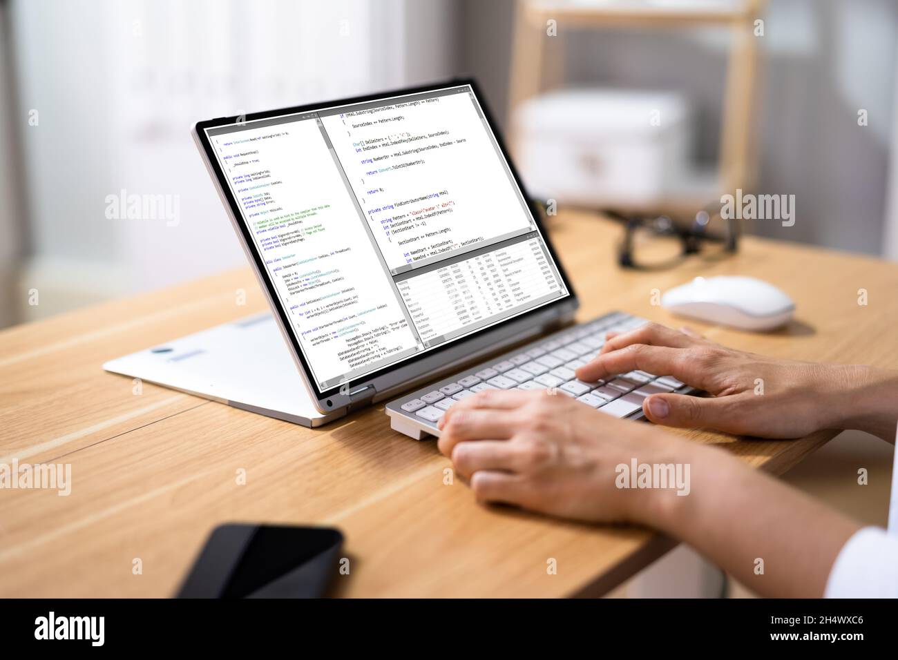 Programmer Woman Coding On Hybrid Laptop Screen Stock Photo - Alamy