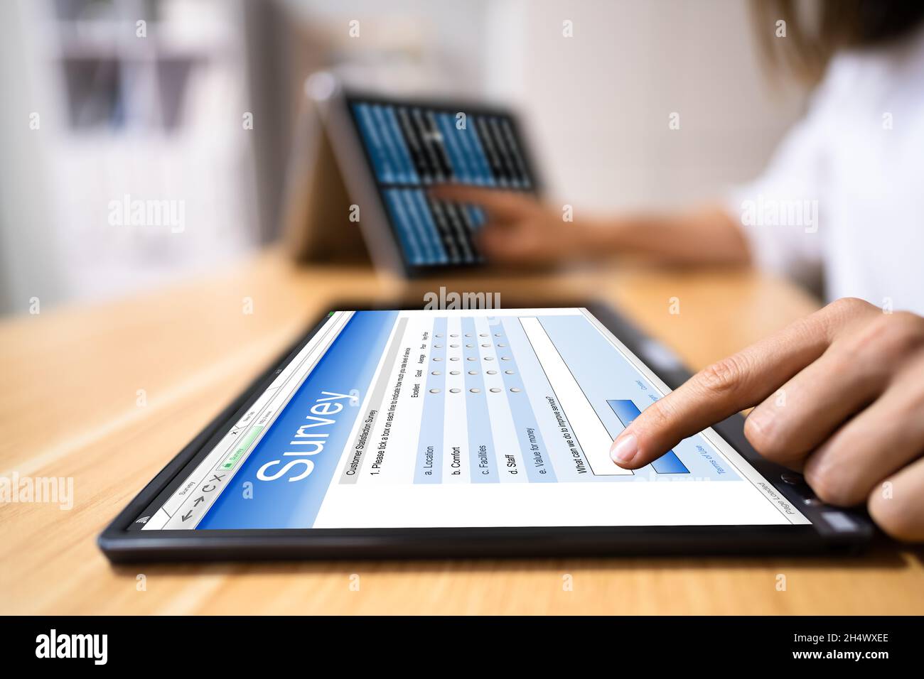 Woman Filling Survey Poll Or Form On Laptop Computer Stock Photo - Alamy