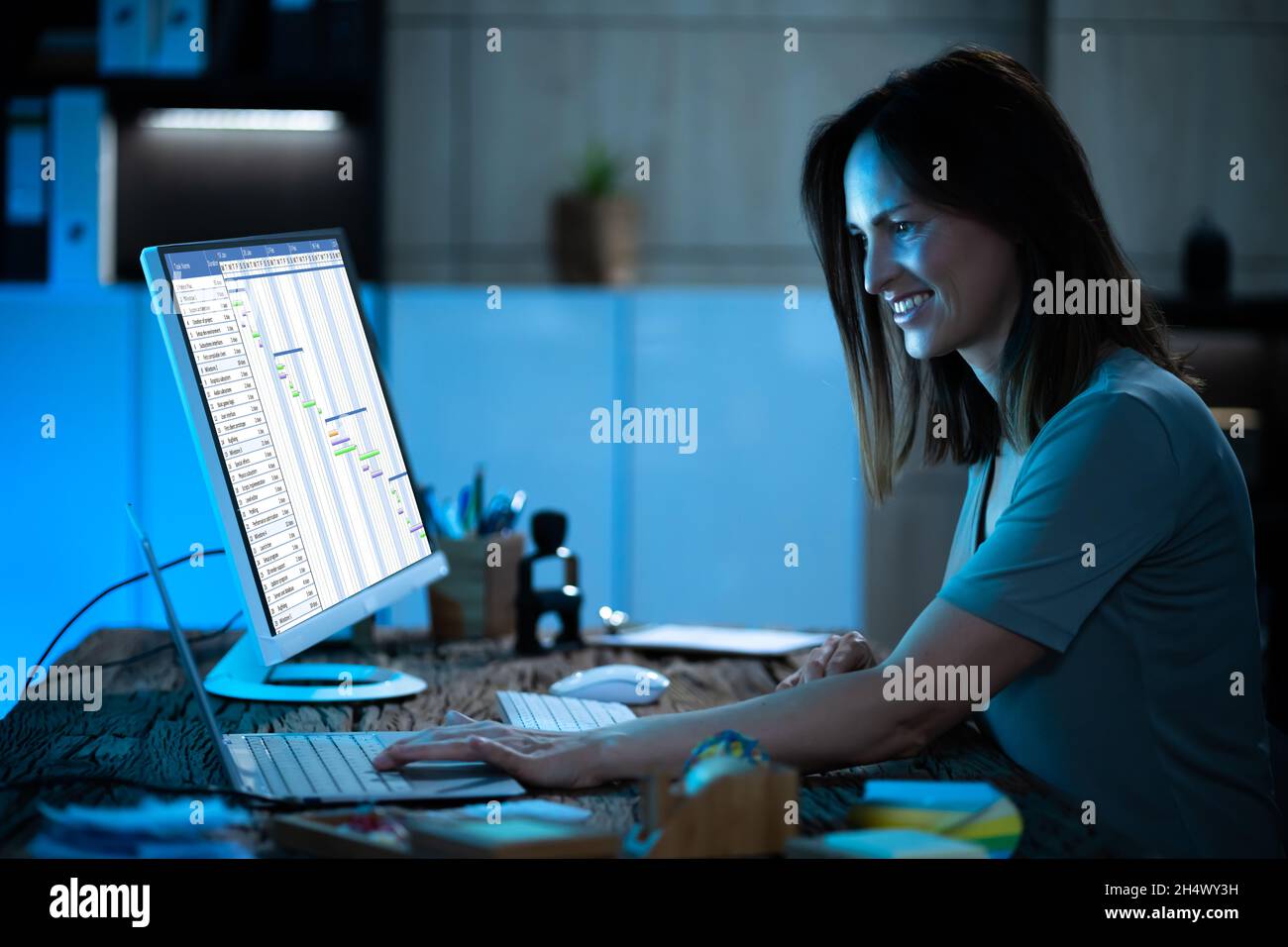Online Scheduling Report Calendar And Time Sheet On Computer Stock ...