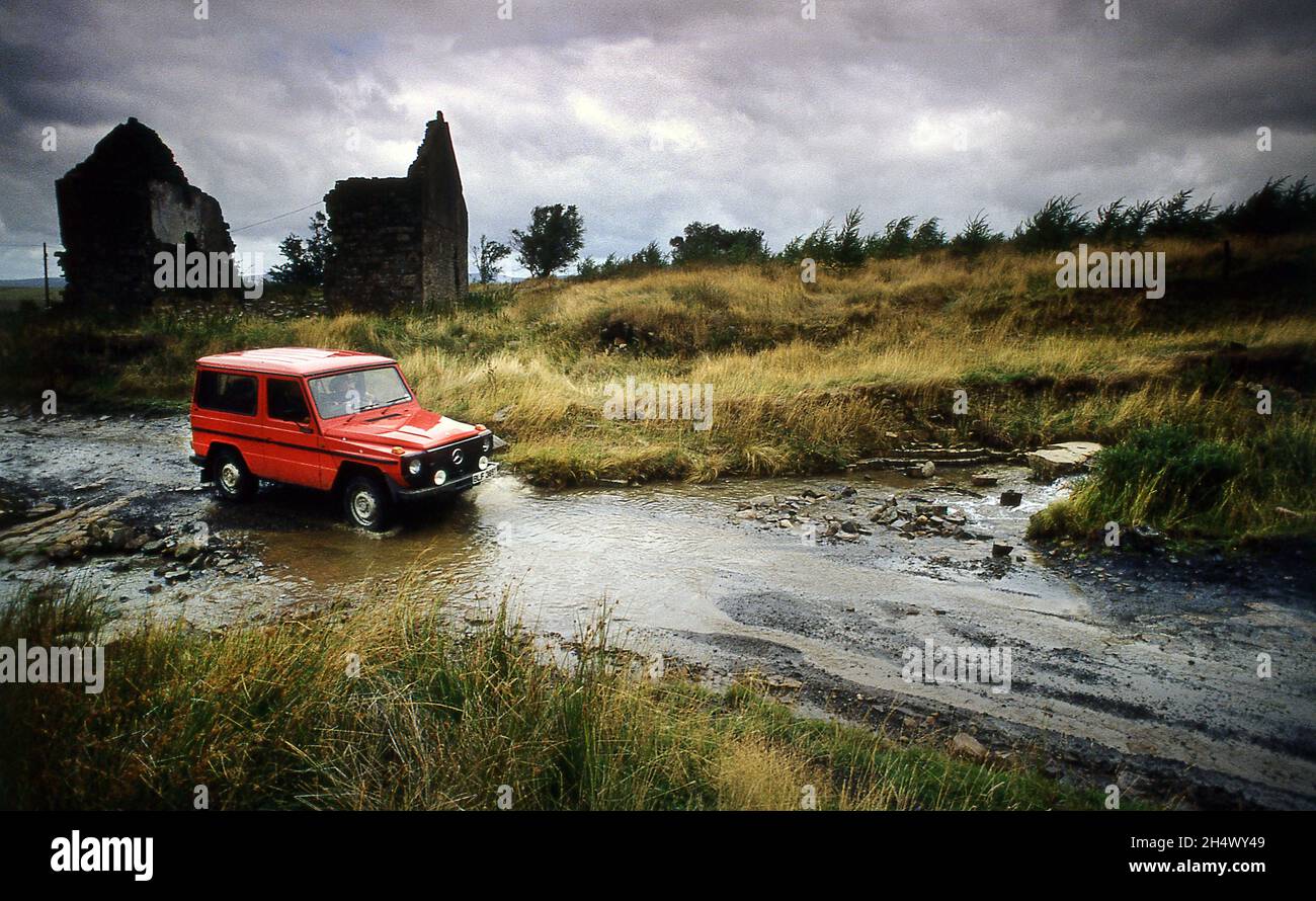 Mercedes G Wagon 300GD 4x4 on a road trip along the drovers trail green ...