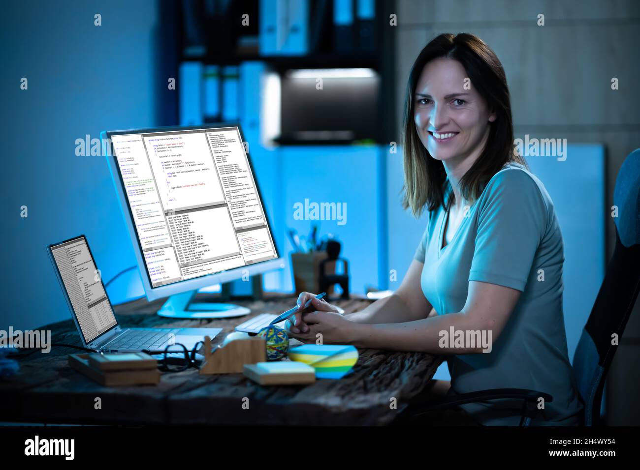 Programmer Woman Coding On Computer. Coder Girl Stock Photo - Alamy