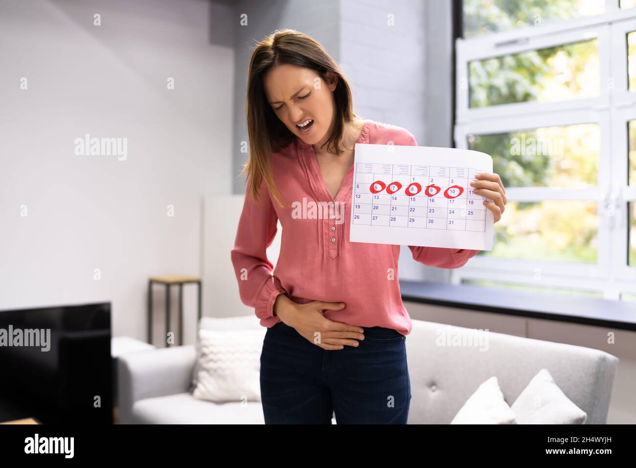 Woman Menstruation And PMS Period Pain. Stomach Ache Stock Photo - Alamy