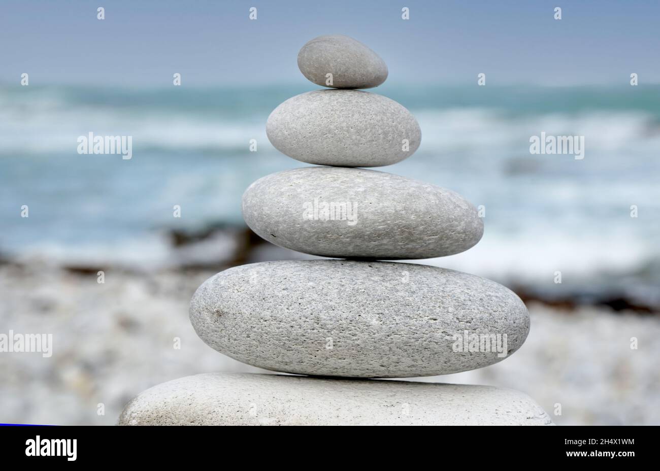 Stack of pebbles balancing, zen concept Stock Photo - Alamy