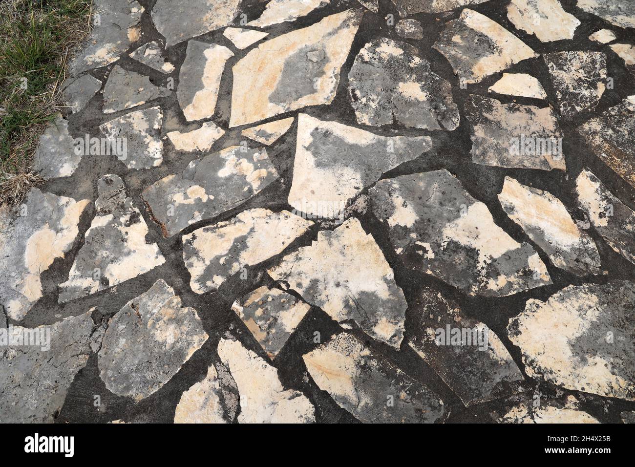 Road paved with natural stone Stock Photo - Alamy