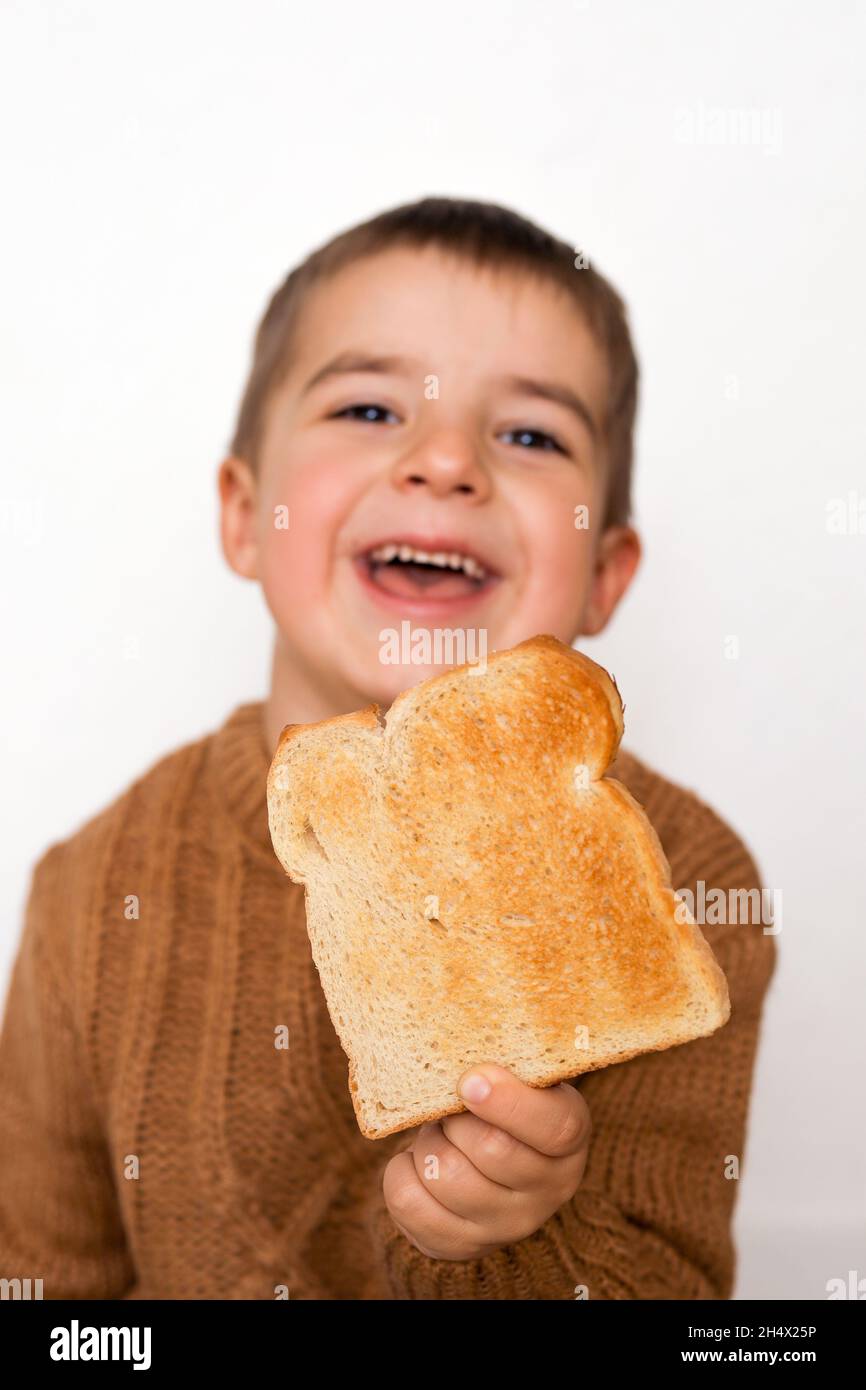 Boy hold bread hi-res stock photography and images - Alamy