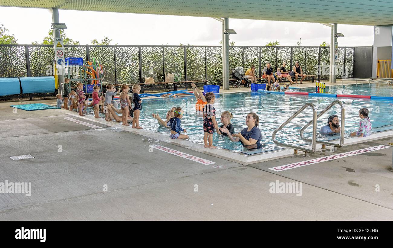 MACKAY, AUSTRALIA - Oct 07, 2021: A closeup of people swimming in the ...