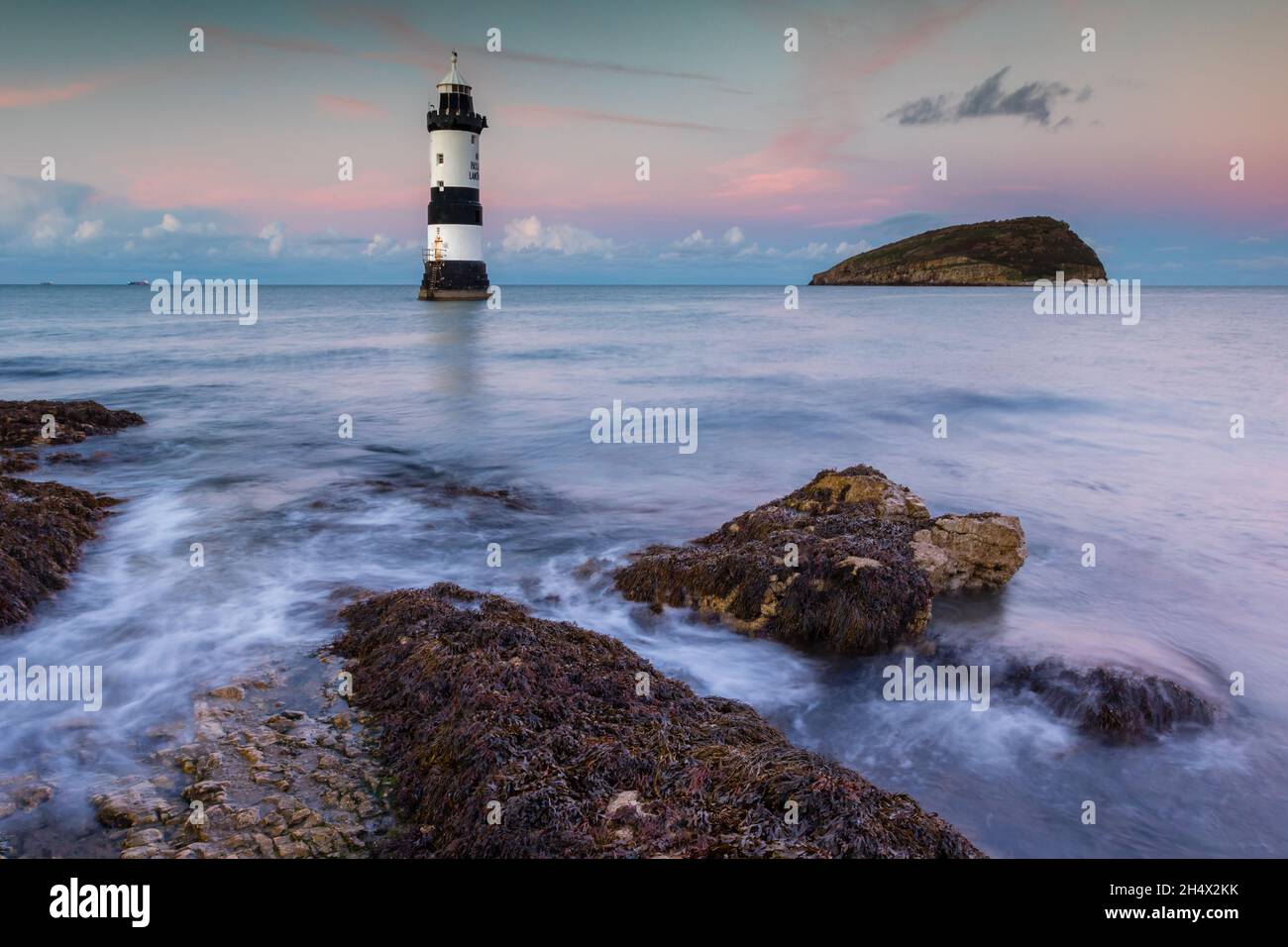 Penmon Point lighthouse, Ynys Mon, (Anglesey) , at sunset, wales Stock ...