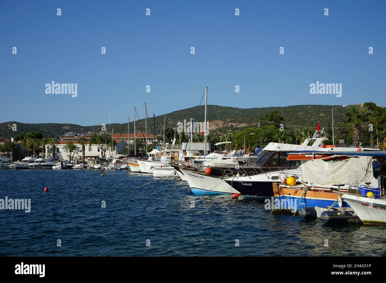 Boats on the beach n Foca on the Aegean Sea in the province of Izmir in ...