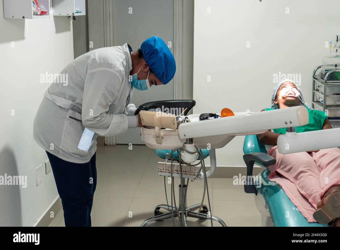 Doctor Preparing Dental Tool For Treatment Stock Photo - Alamy