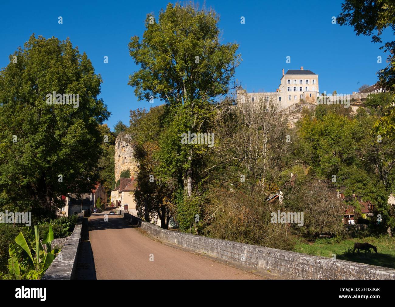 Mailly-le-Chateau viewed from the old bridge over the River Yonne ...