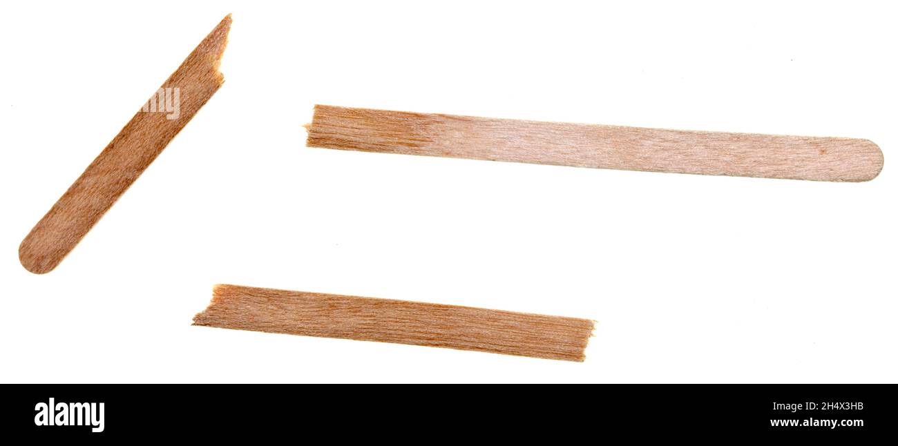 Broken sticks isolated on white background Stock Photo - Alamy