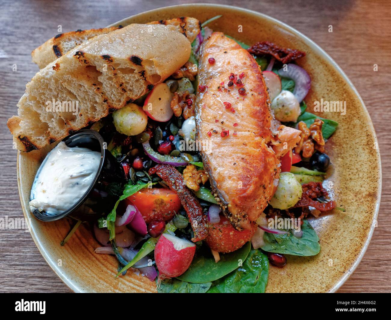 Healthy balanced lunch - grilled red fish fillet salmon and tomatoes ...