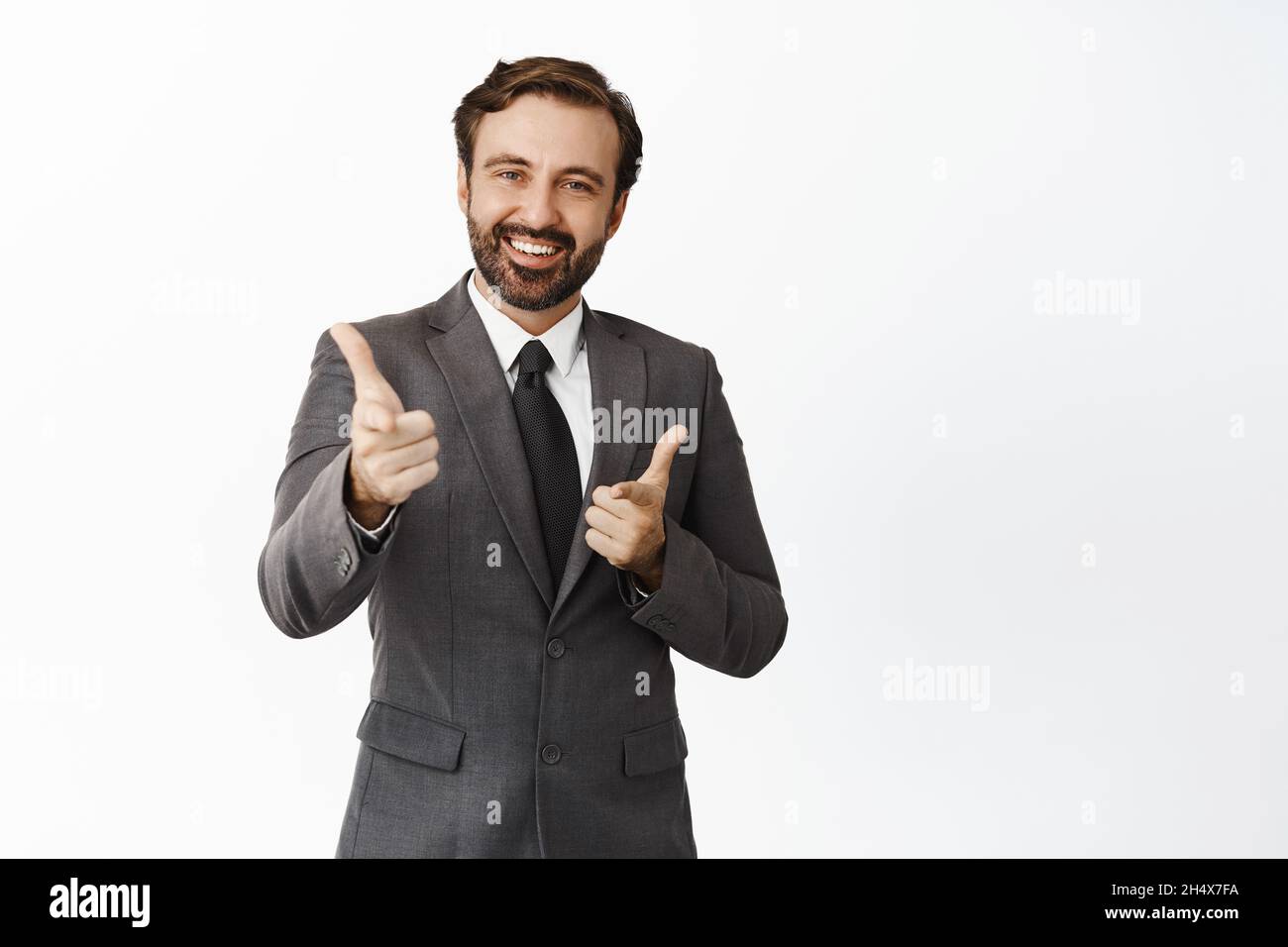 Good job. Smiling boss pointing fingers at camera, showing thumbs up ...