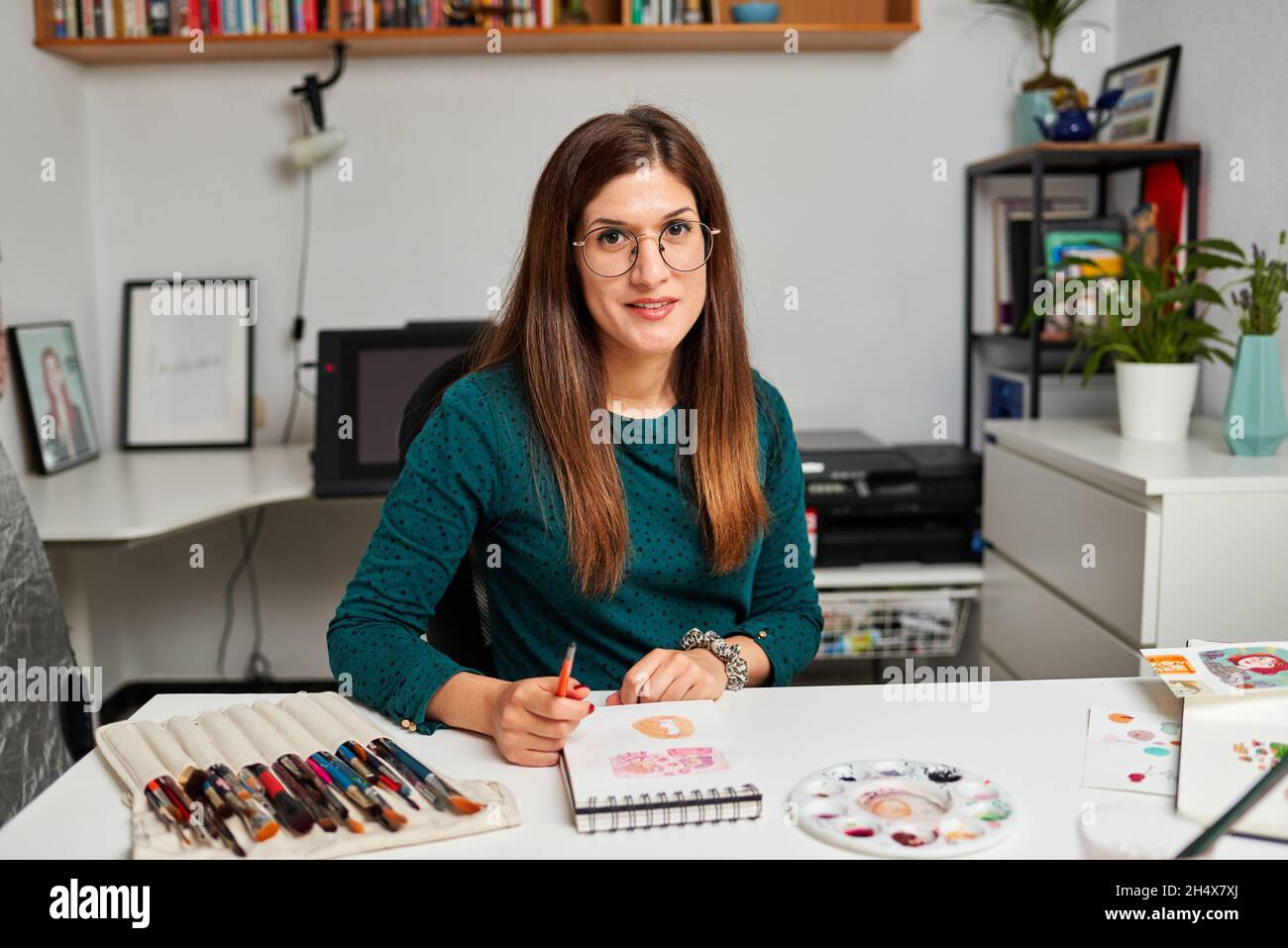 Illustrator woman teleworking from her home office Stock Photo - Alamy