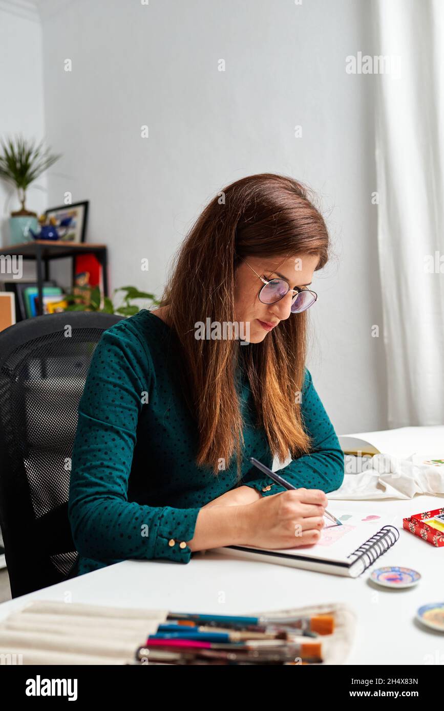 Illustrator woman teleworking in home office Stock Photo - Alamy