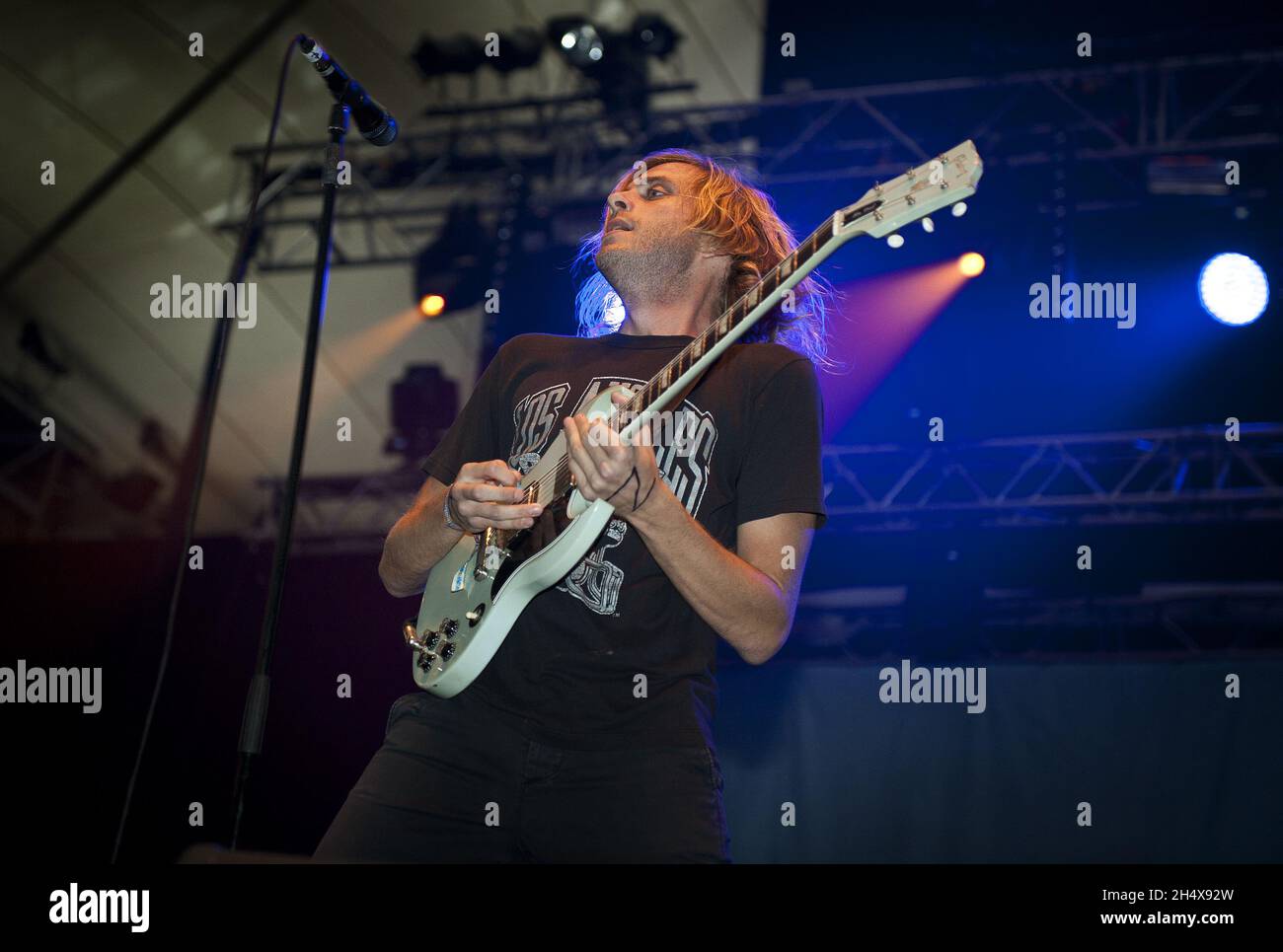Aaron Bruno of Awolnation performing on stage during Vans Warped Tour ...