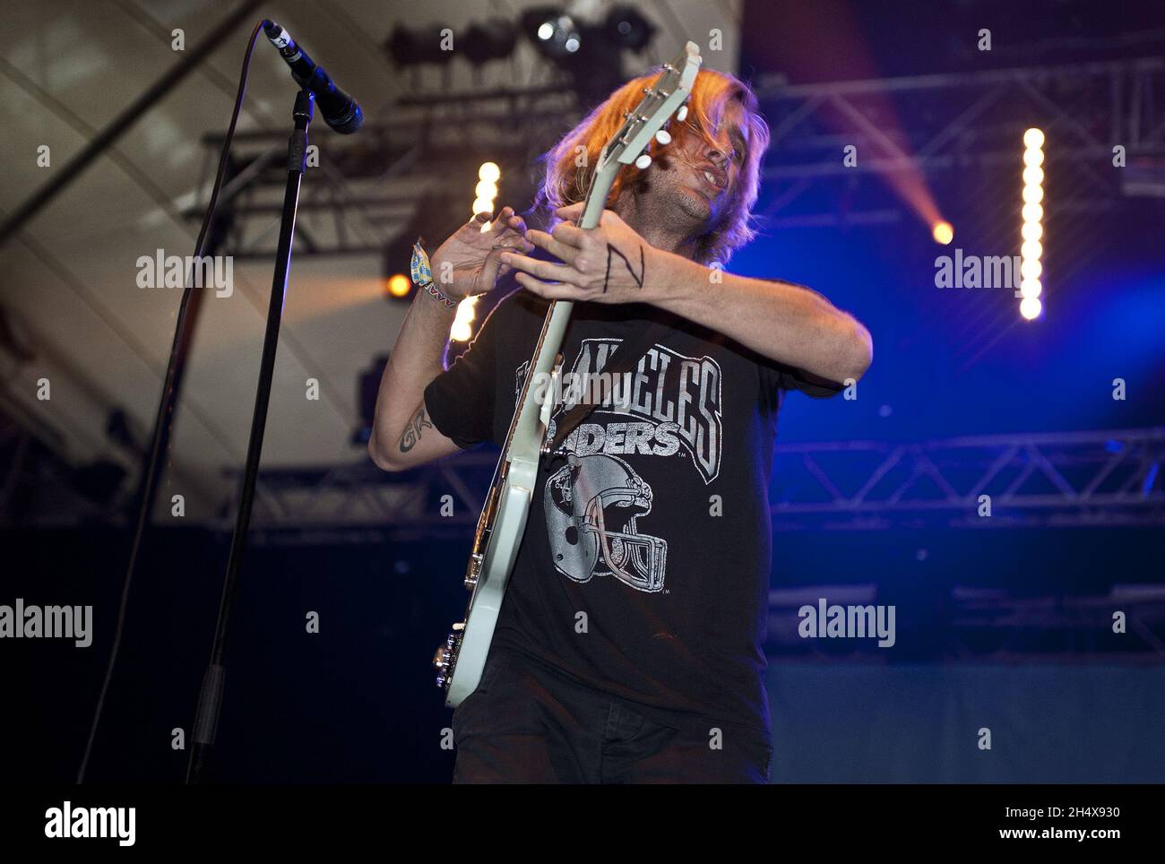 Aaron Bruno of Awolnation performing on stage during Vans Warped Tour ...